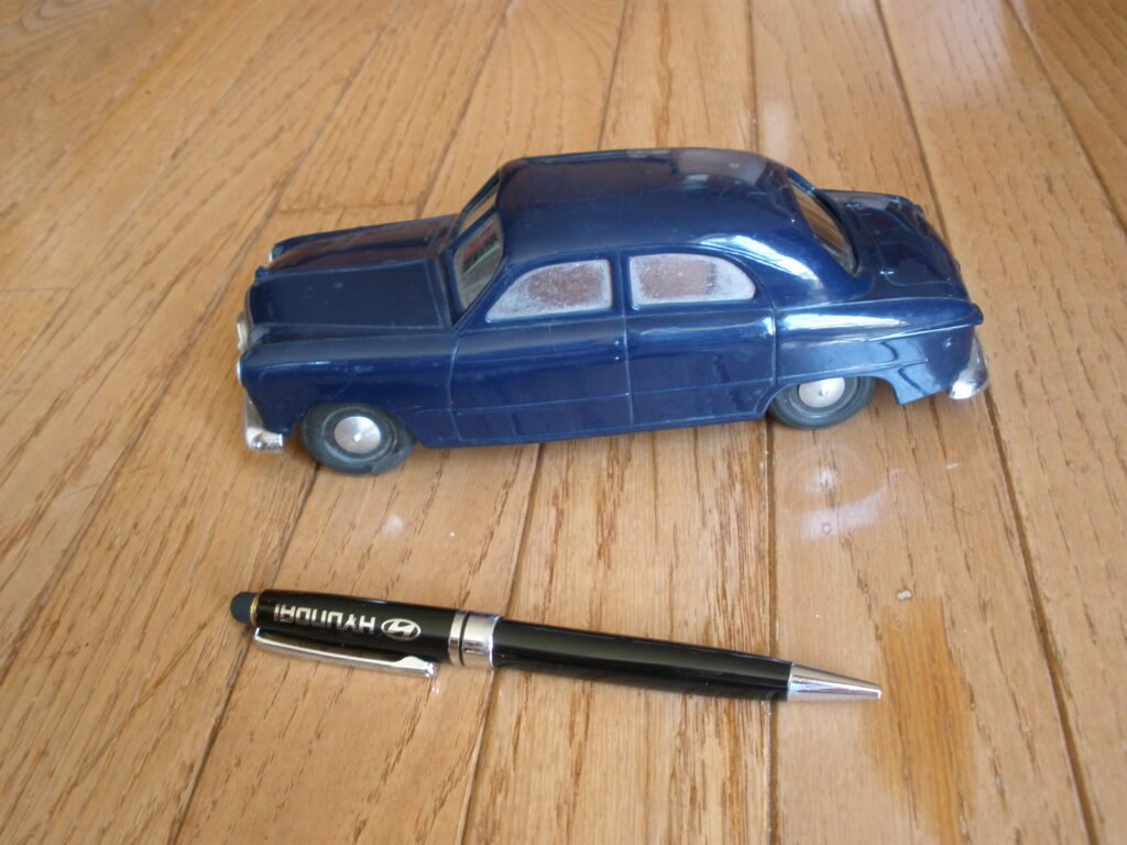 1950s FORD 4-DOOR SEDAN WINDUP TOY CAR – SUPERNOVA ANTIQUES