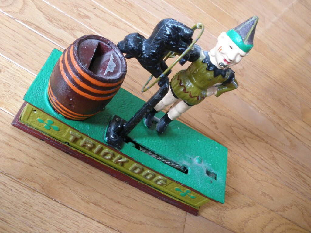 TRICK DOG & CIRCUS CLOWN MECHANICAL SAVINGS BANK – SUPERNOVA ANTIQUES